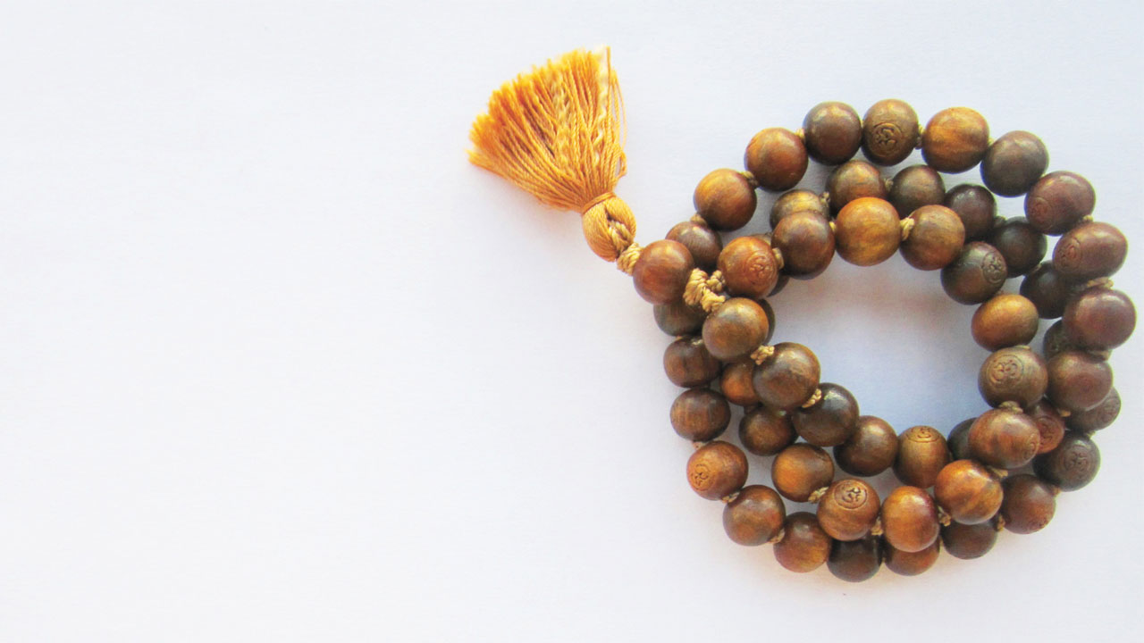 Making malas | Om Yoga Magazine