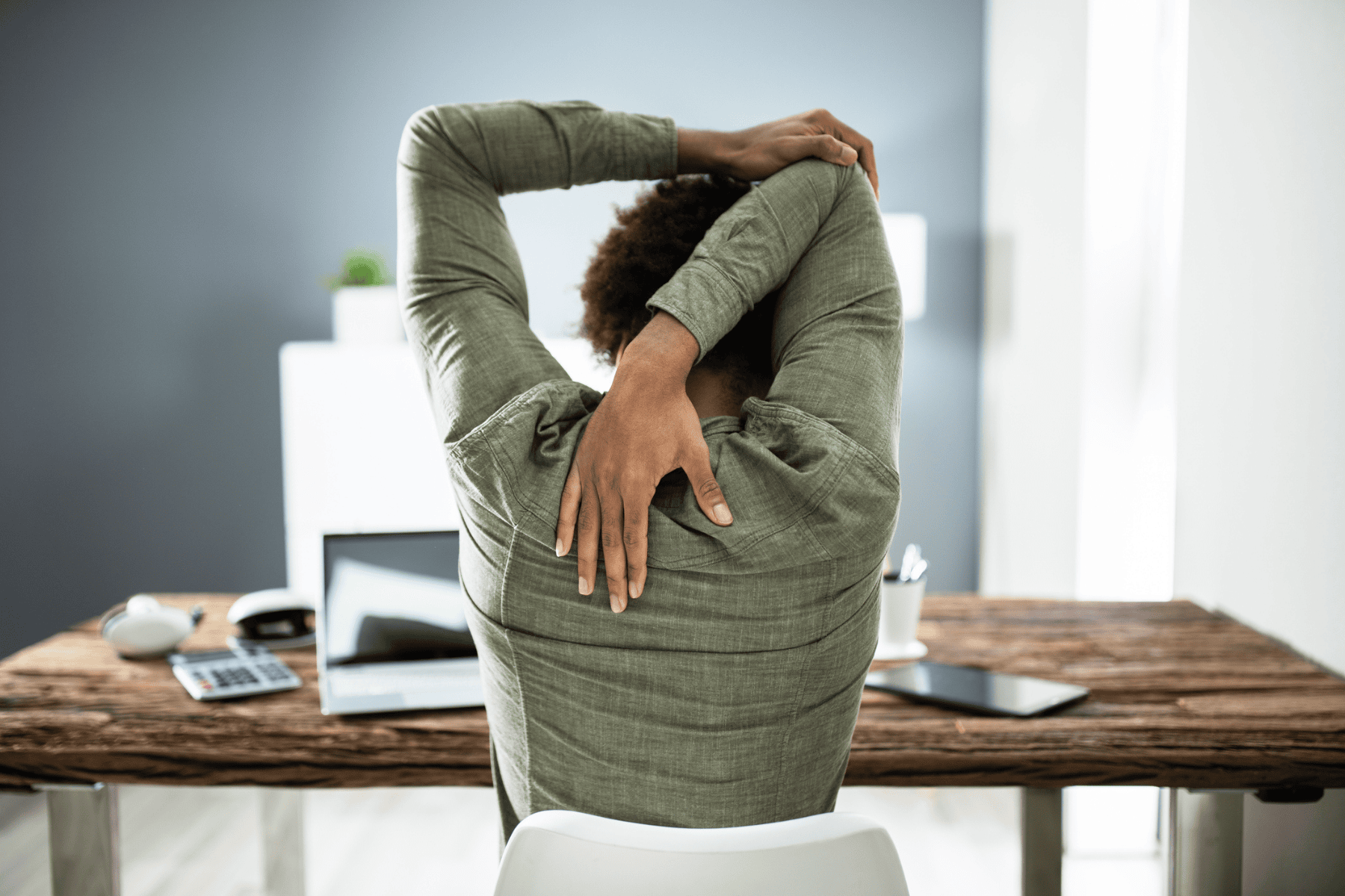 Yoga in the Workplace: Exercises You Can Do at Your Desk | Om Yoga Magazine